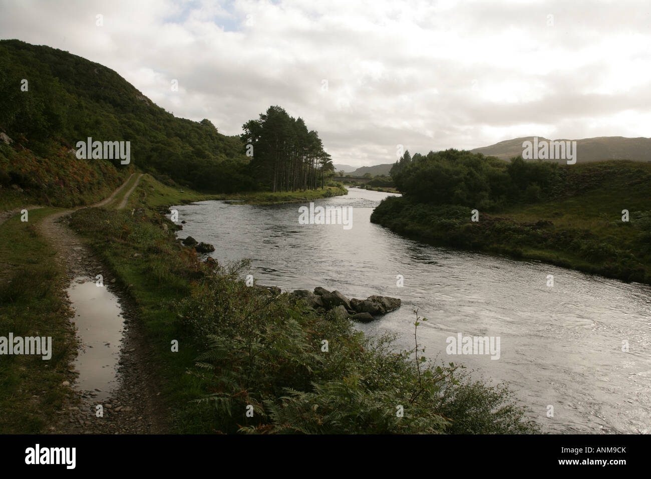Landscape view of dirt track by river Hope, Sutherland, Scottish ...