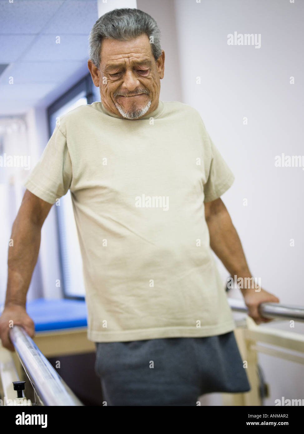 Physically challenged senior man walking on a treadmill Stock Photo - Alamy