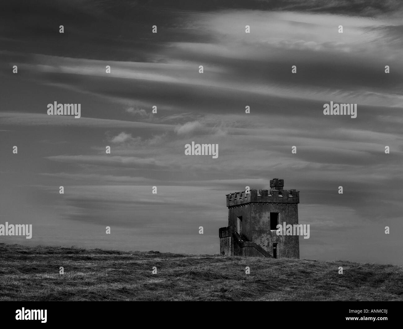derelict irish castle with dramatic clouds Stock Photo - Alamy