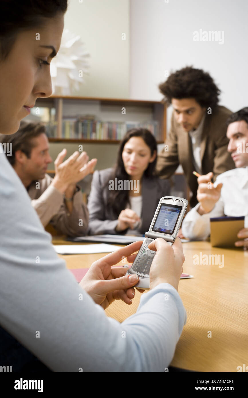 Person texting during meeting hi-res stock photography and images - Alamy