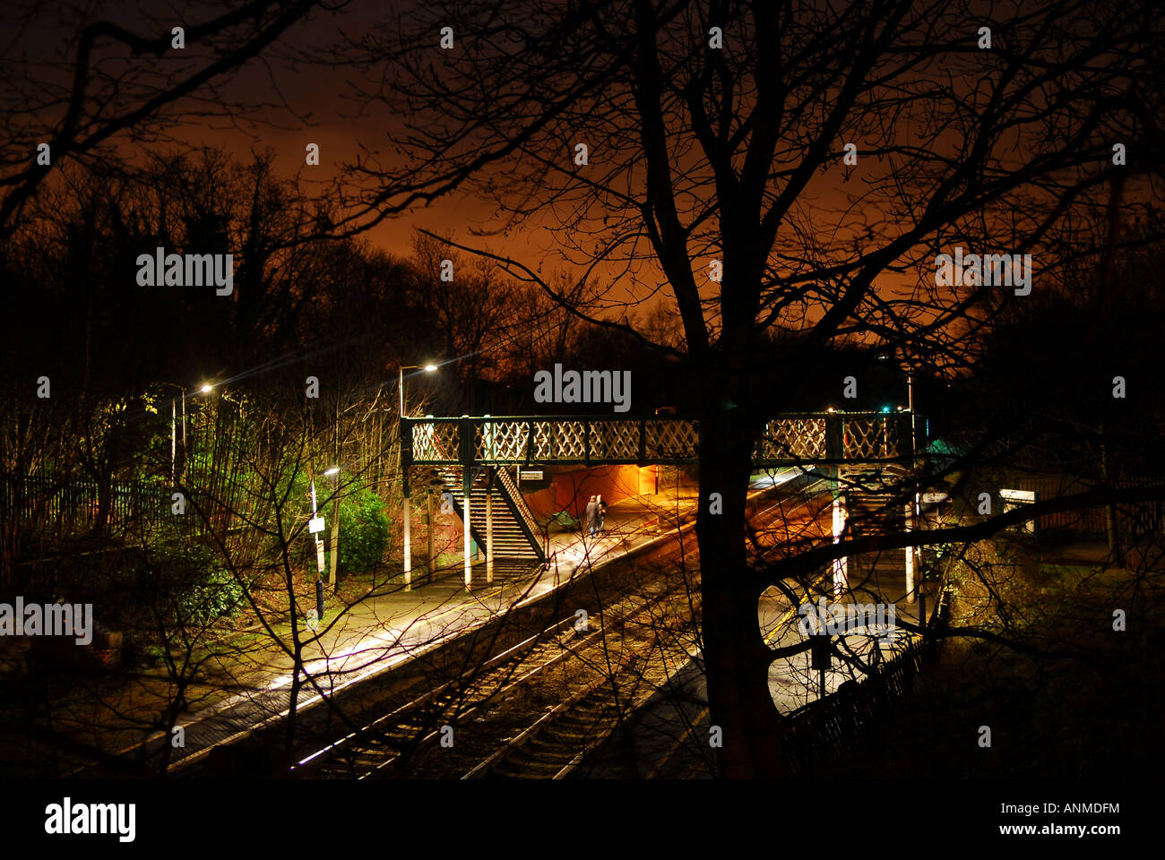 Atmospheric scene of a train platform at night with ambient lighting ...