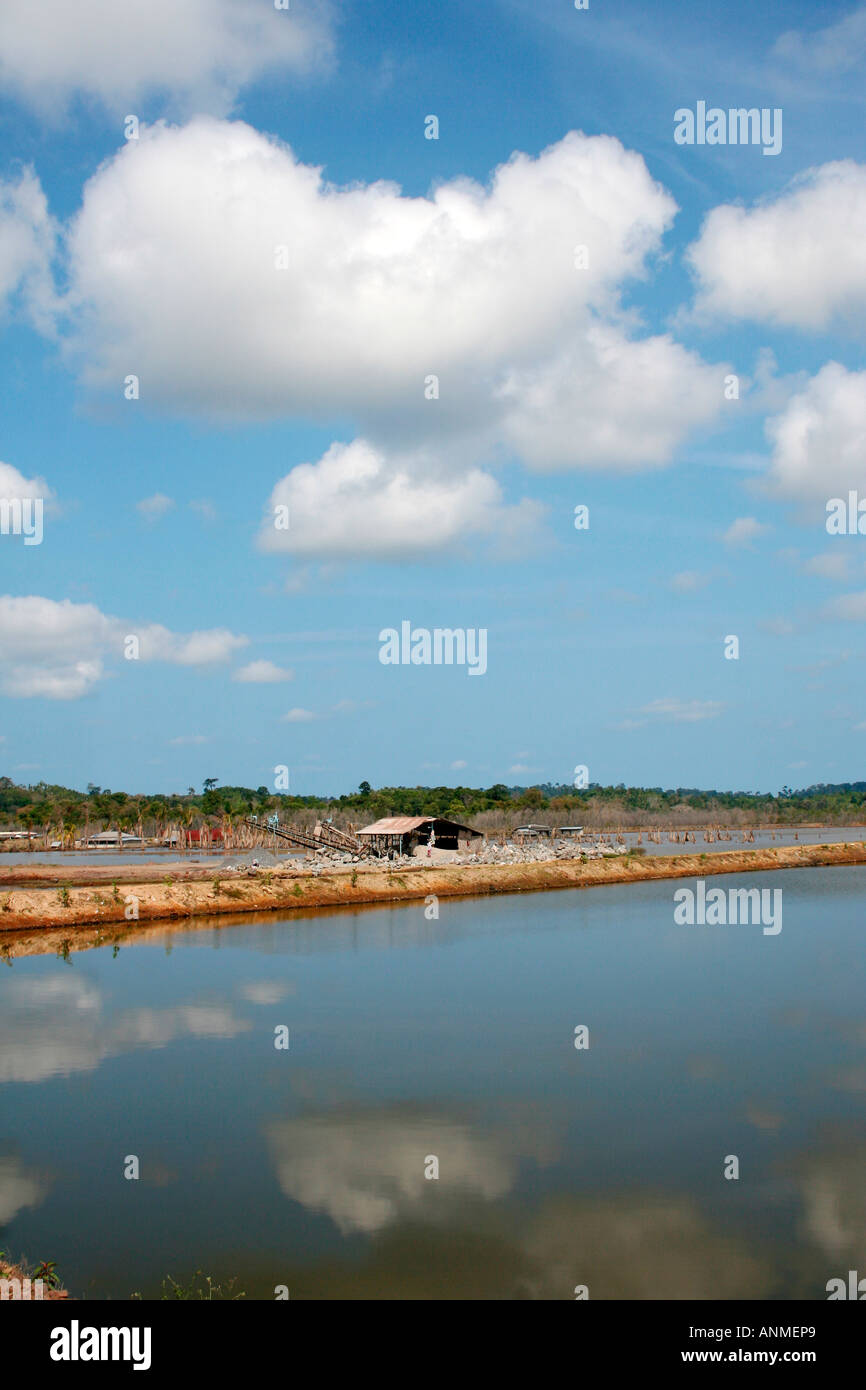 Isolated buildings and a flooded area after Tsunami with reflection of ...