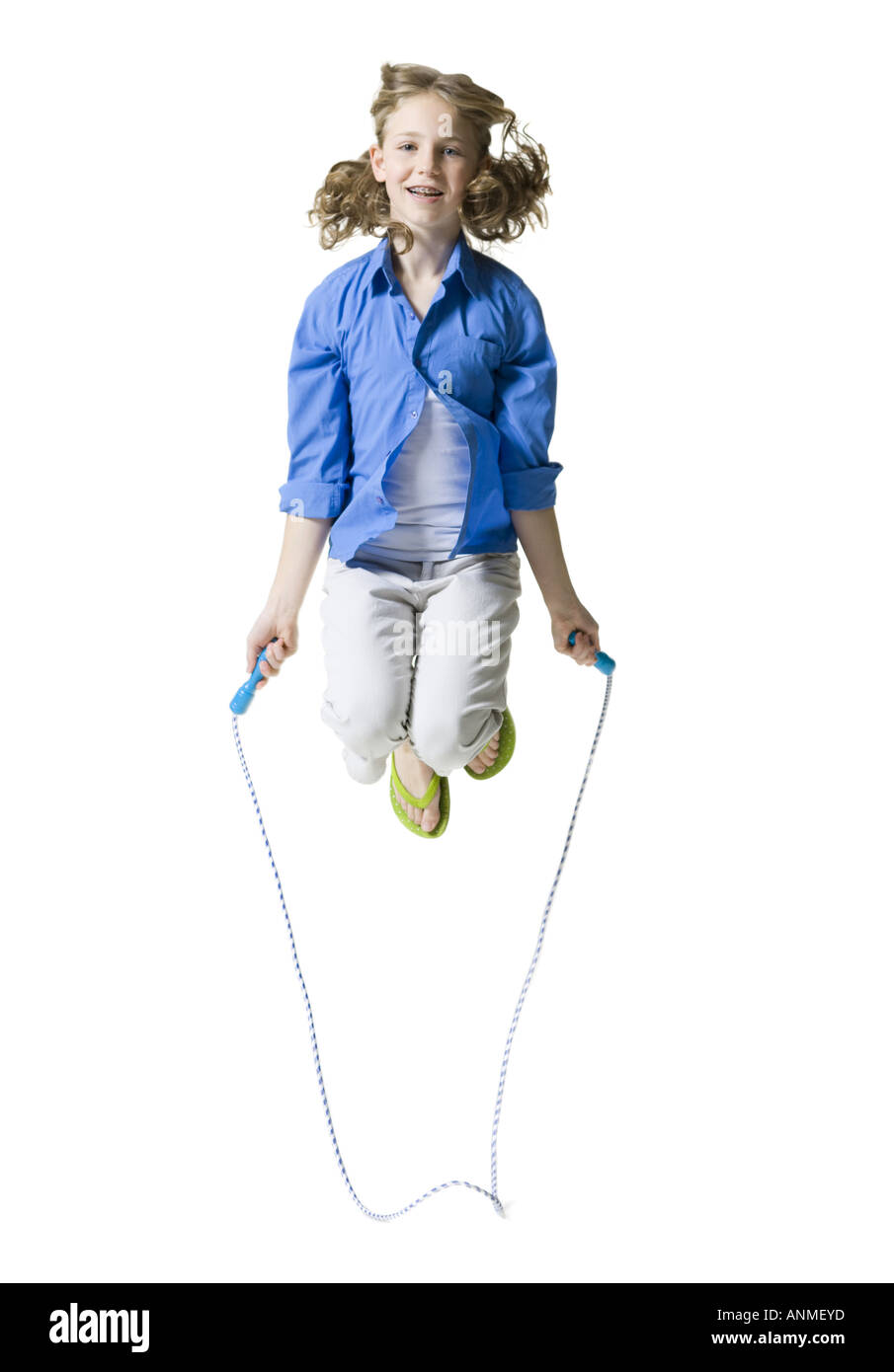 Portrait of a girl jumping rope Stock Photo - Alamy