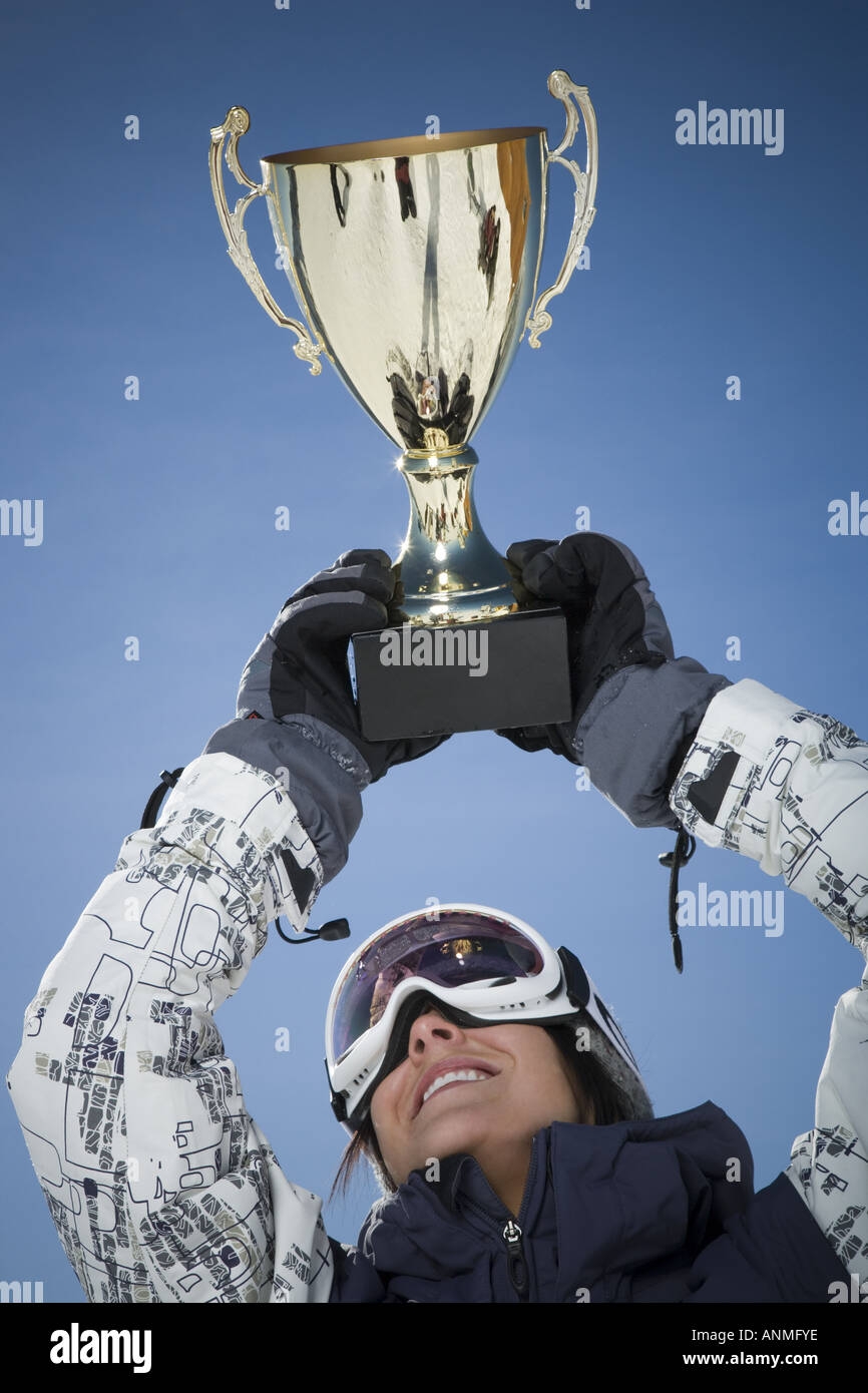Close up smiling holding trophy achievement success hi-res stock ...