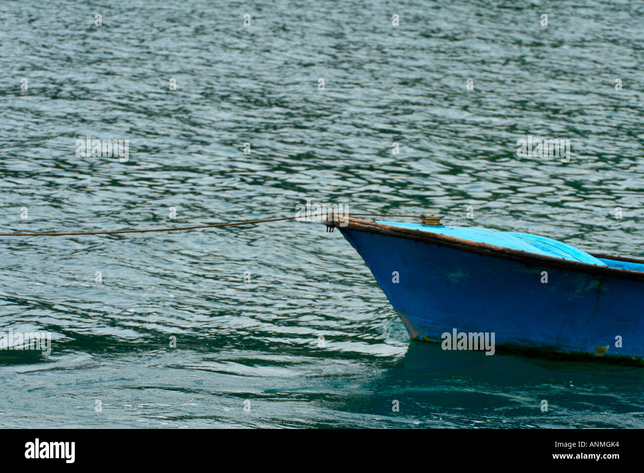 The prow of an anchored boat in the blue waters at Jolly buoy Andaman ...