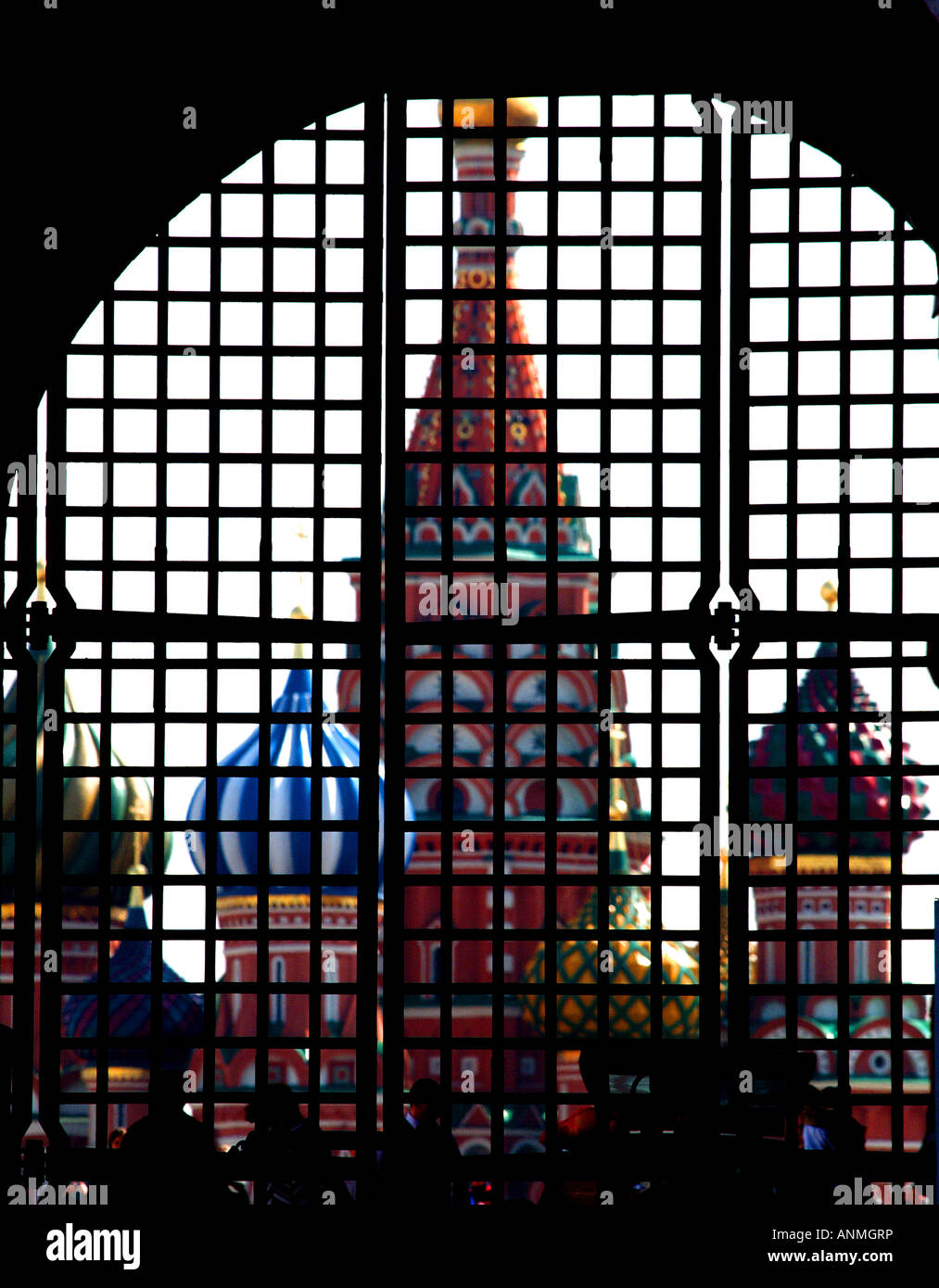 Saint Basils Cathedral Moscow spires framed in a lattice gate Stock ...