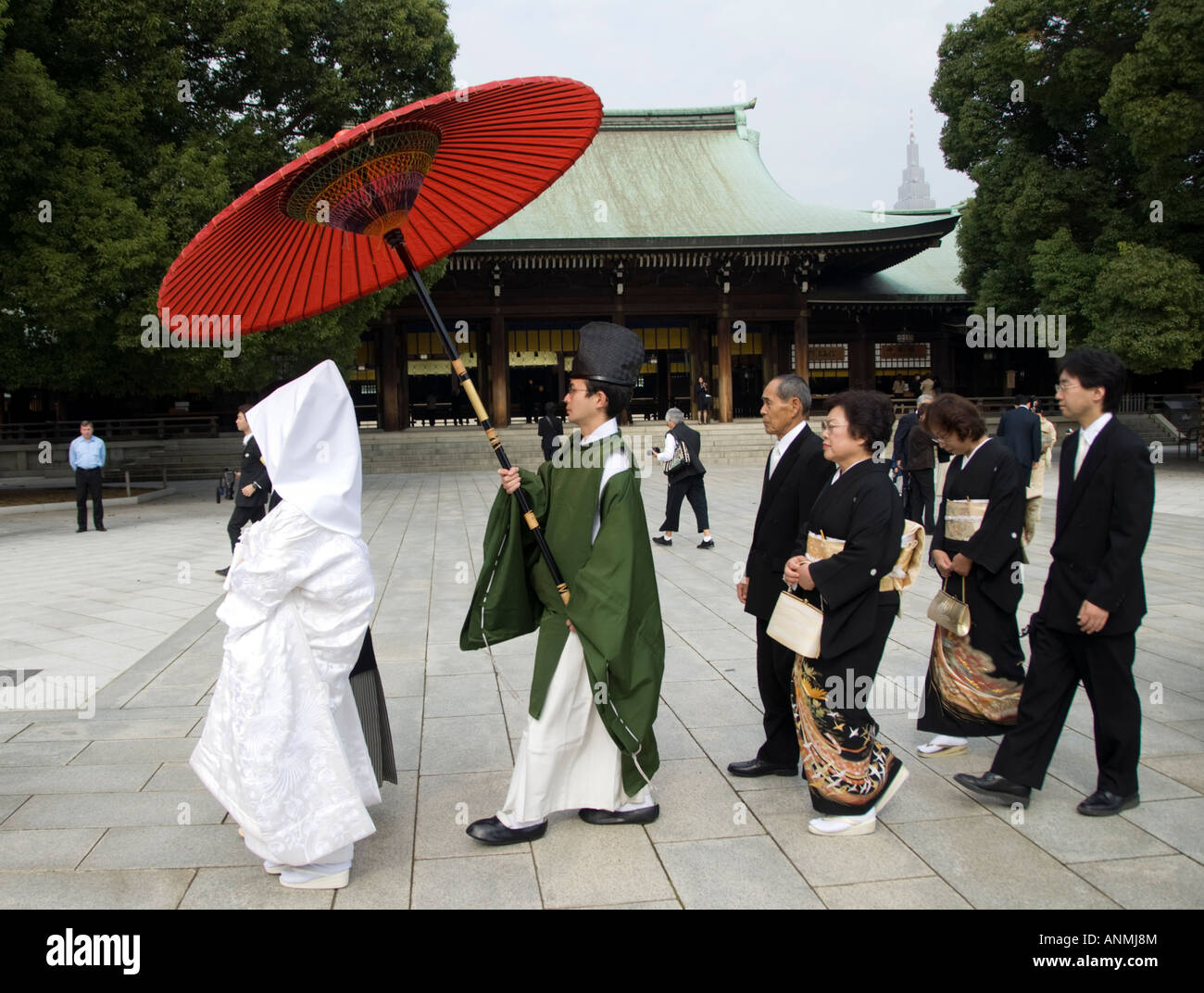 Traditional wedding ceremony procession at Meiji Jingu Shrine in Tokyo ...