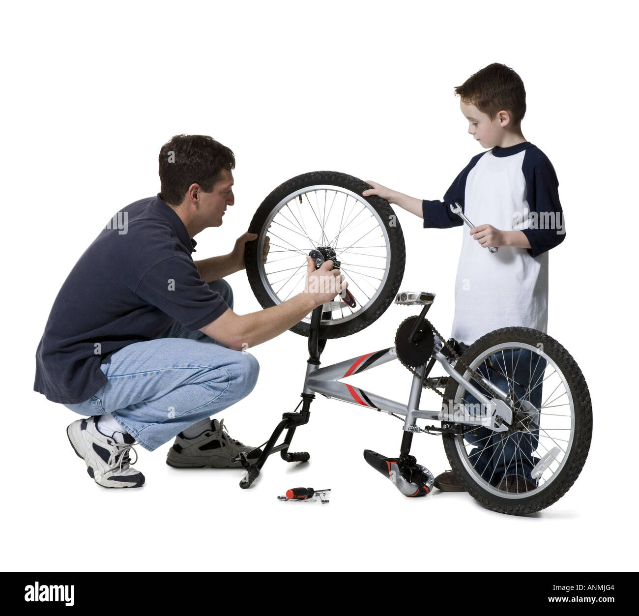 Repairing cycle Cut Out Stock Images & Pictures - Alamy