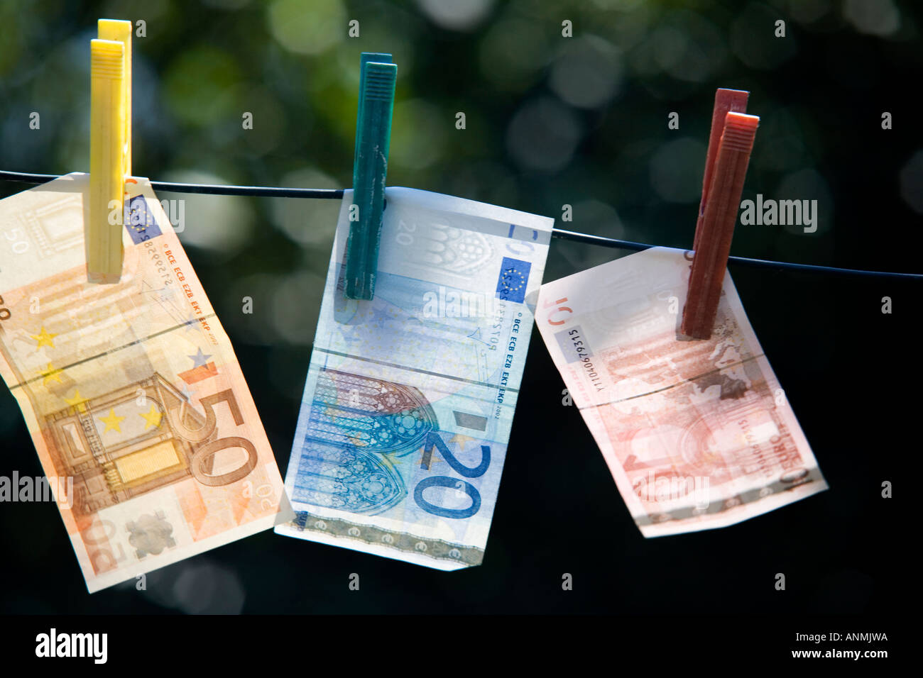 Money on a washing line Stock Photo - Alamy