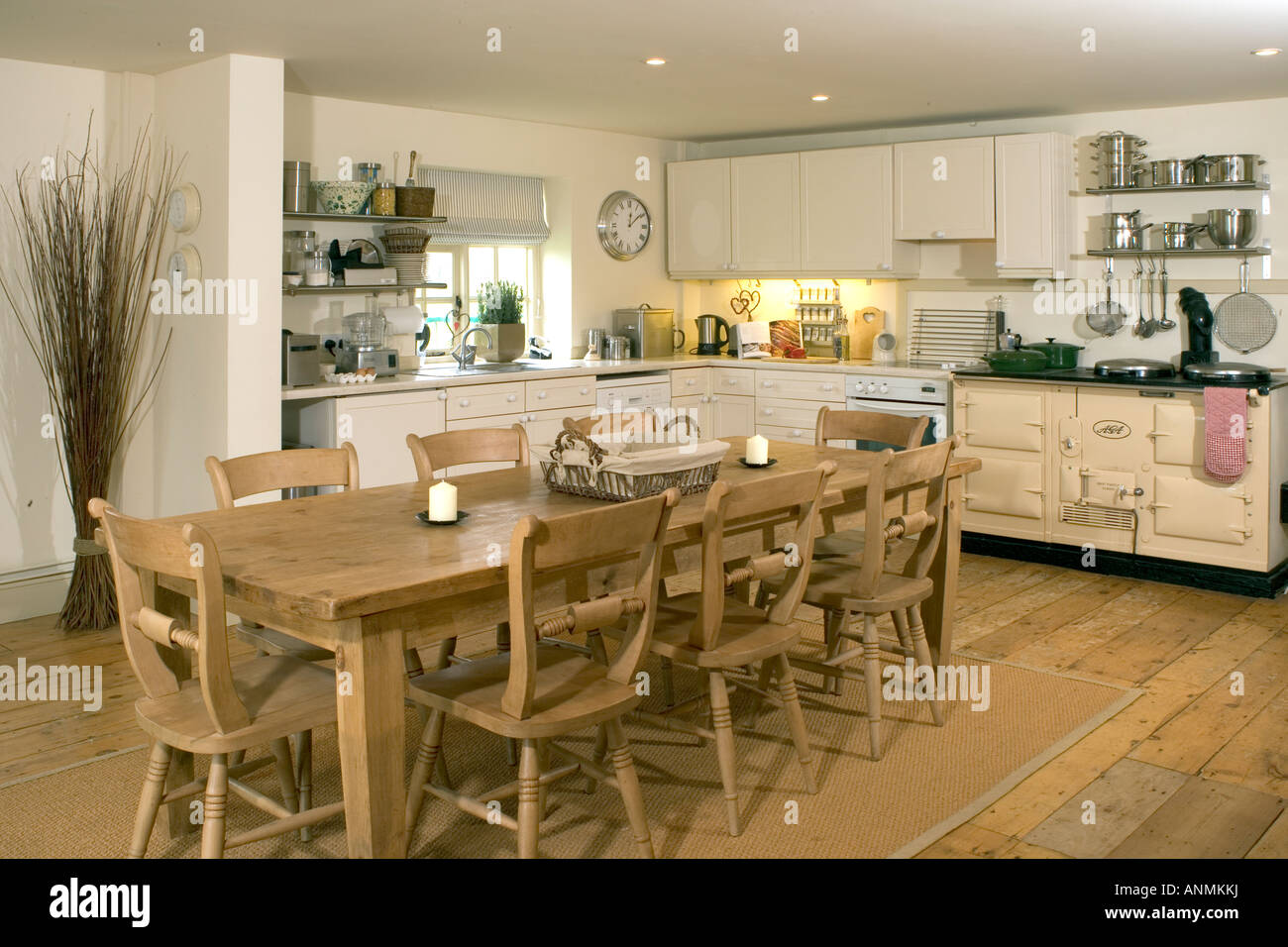 UK. A house interior, large traditional style kitchen with dining area ...