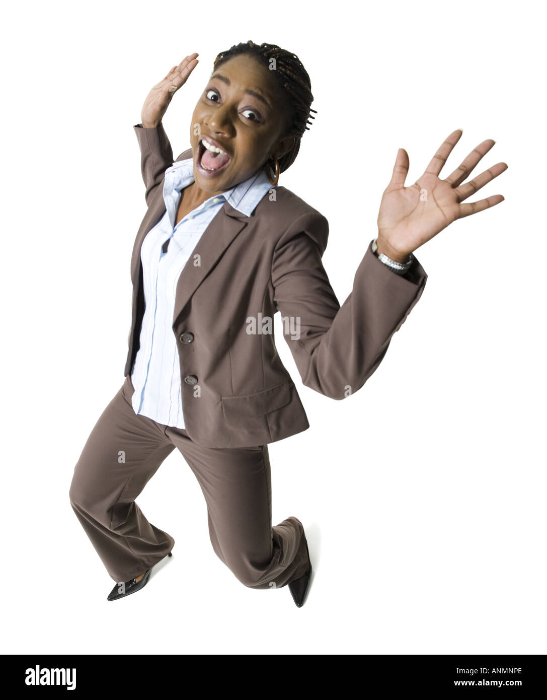 Portrait of a businesswoman making a face with her arms raised Stock ...