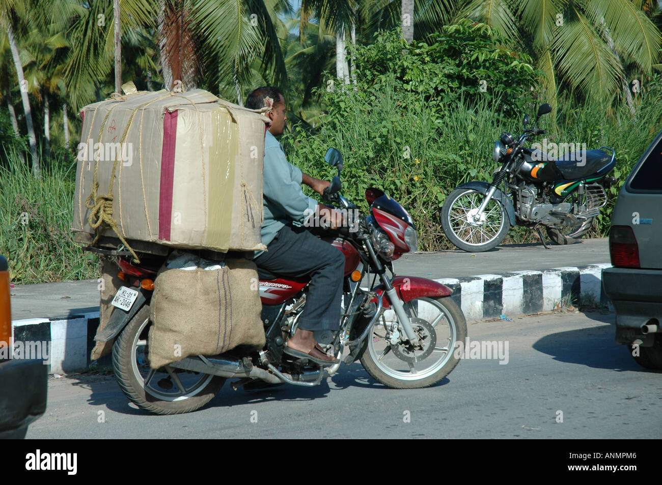 Indian man on motorcycle Kerala southern India Stock Photo - Alamy