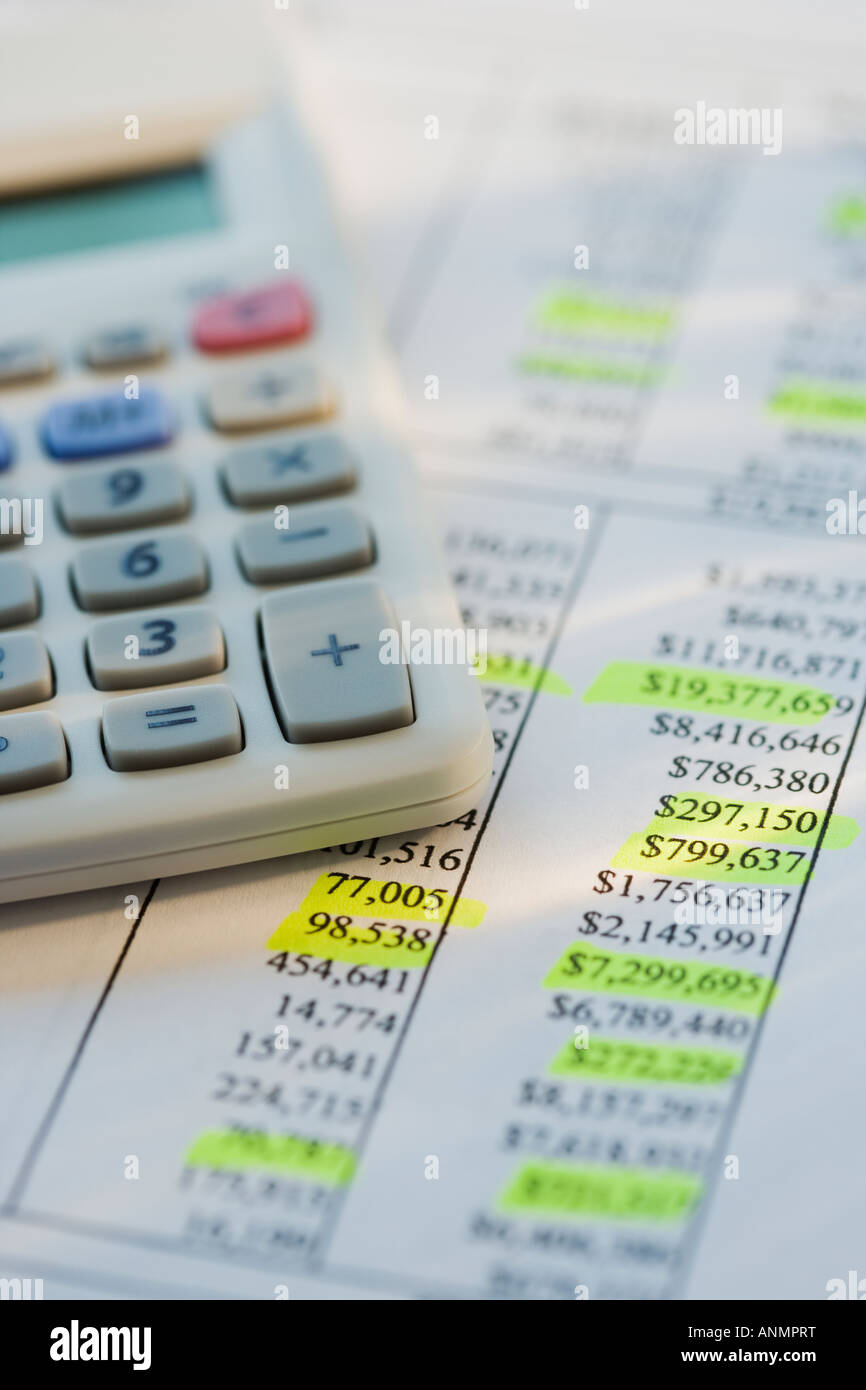 Close up of calculator on sheet of numbers Stock Photo - Alamy