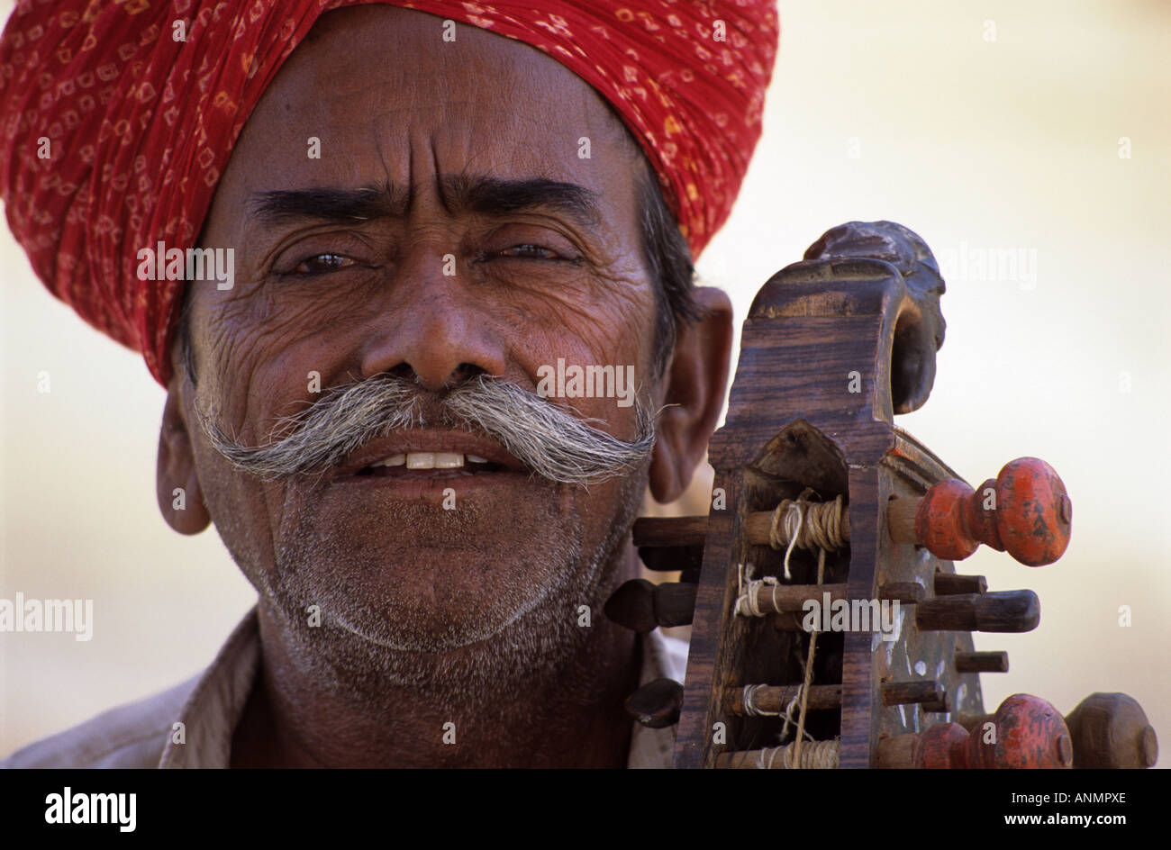 Indian street musician Stock Photo - Alamy