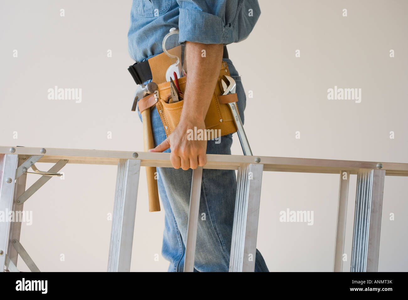 Man Wearing Tool Belt High Resolution Stock Photography and Images - Alamy