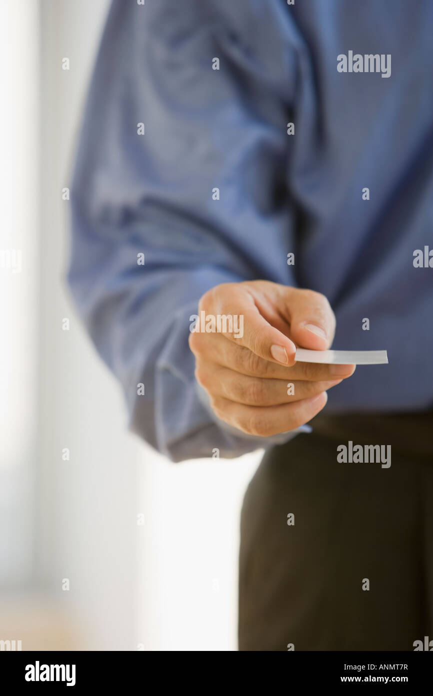 Handing out business card hi-res stock photography and images - Alamy