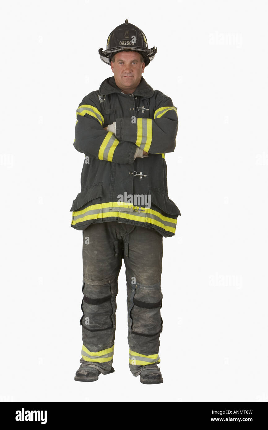 Male firefighter with arms crossed Stock Photo - Alamy