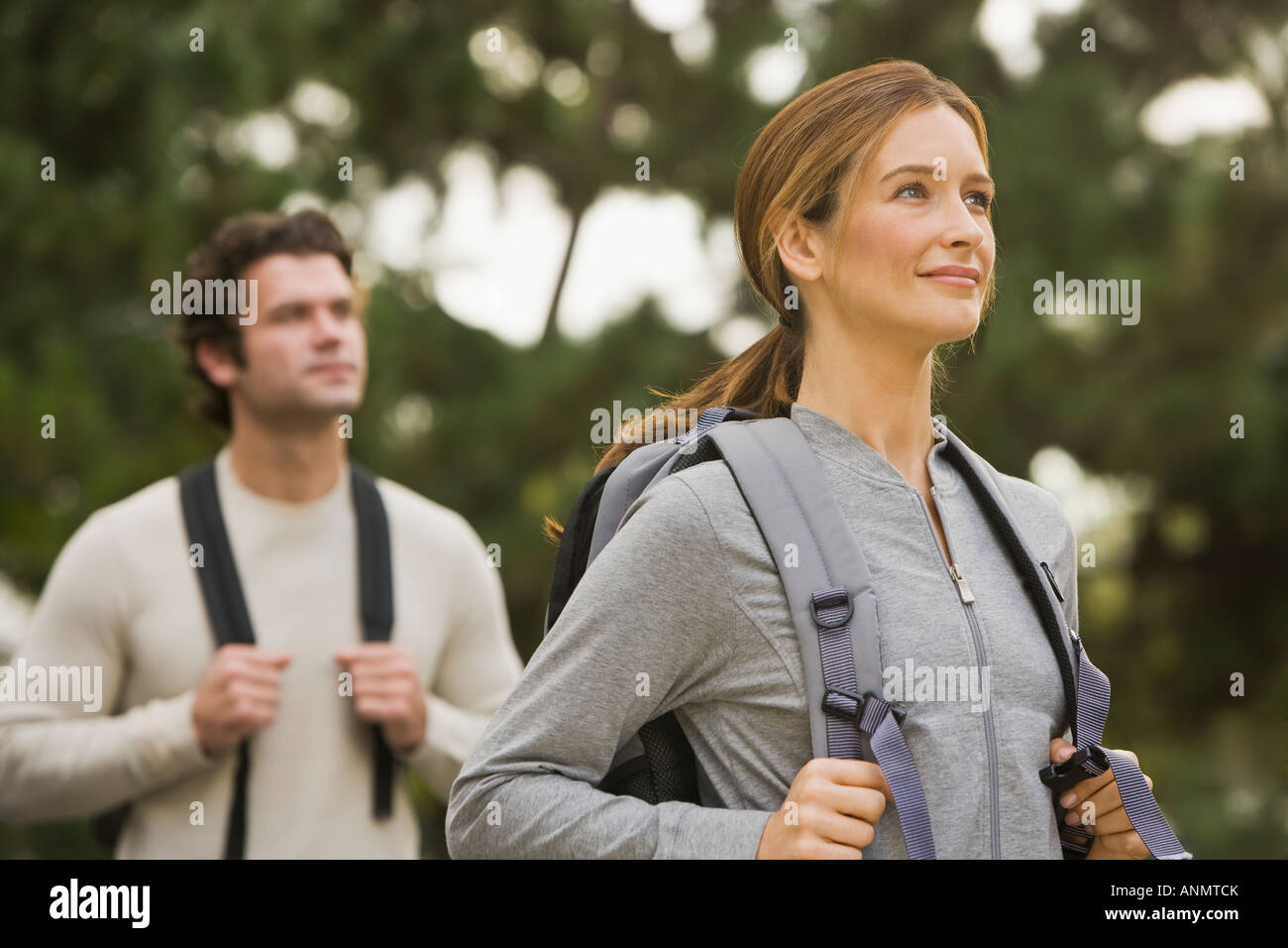 People wearing backpacks hi-res stock photography and images - Alamy