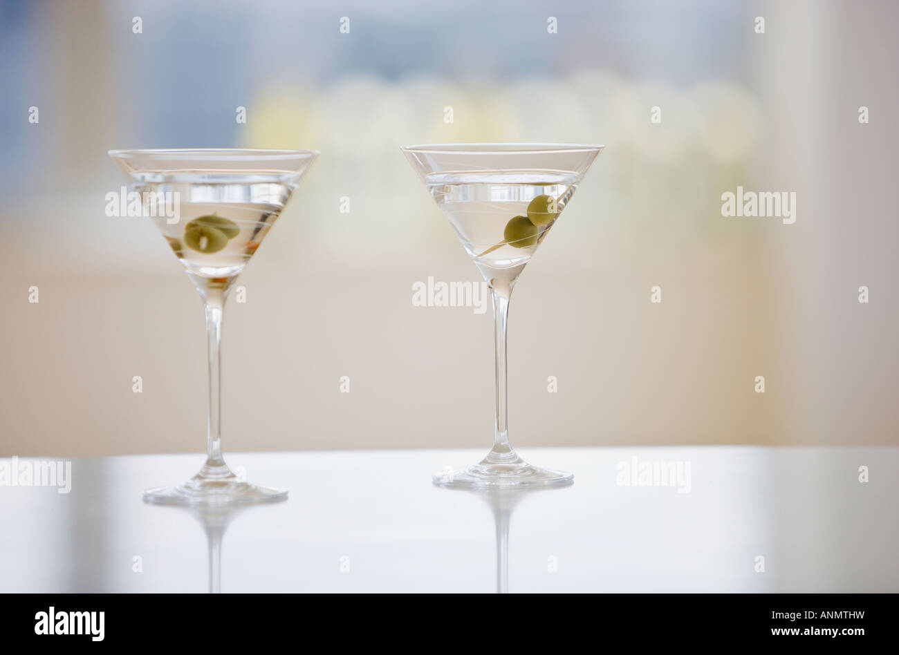 Two martinis on table Stock Photo - Alamy