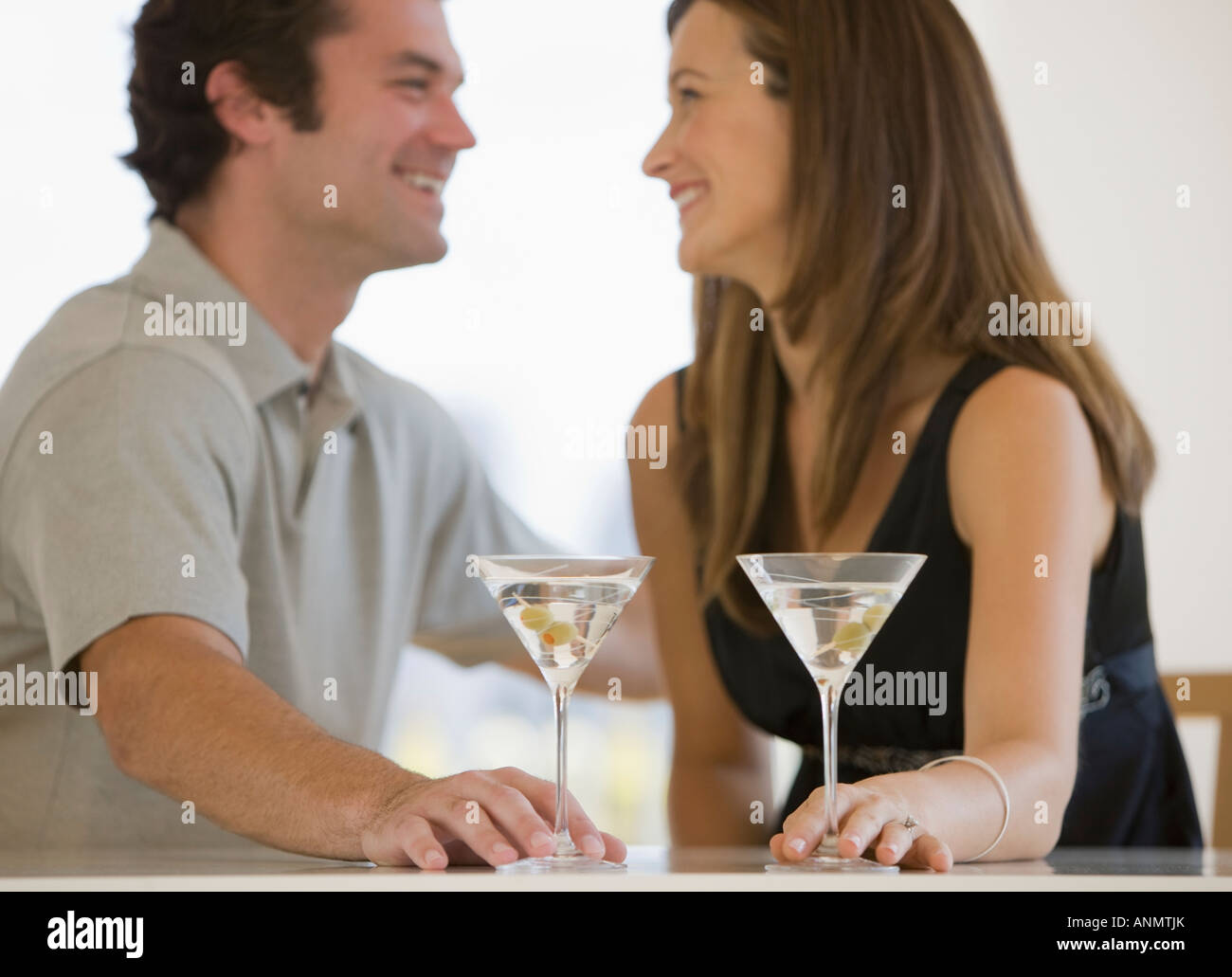 Woman drinking cocktail from martini hi-res stock photography and ...