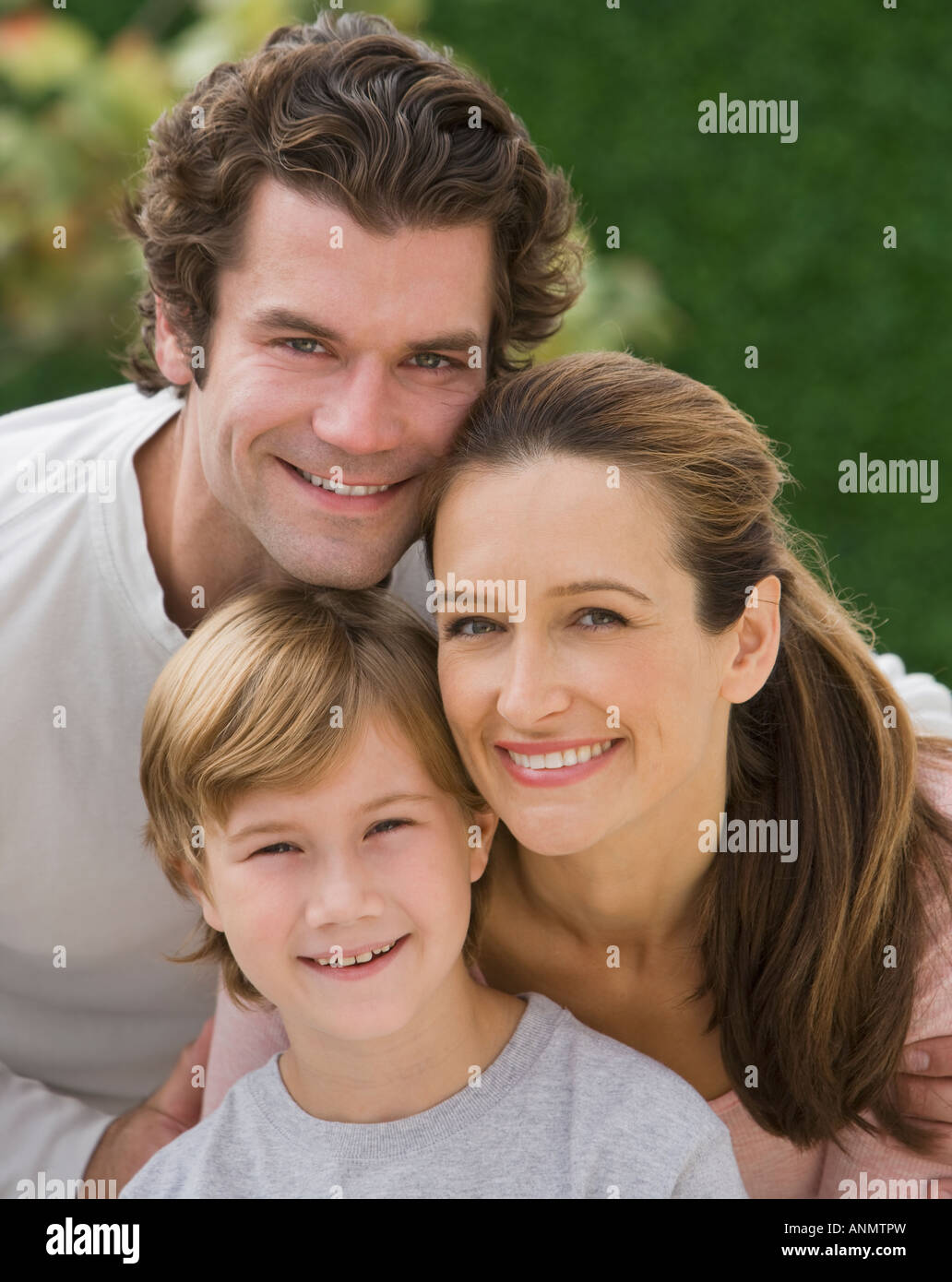 Portrait of family with one child Stock Photo - Alamy