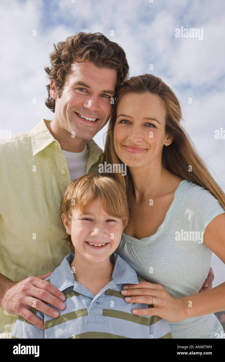 Portrait of family with one child Stock Photo - Alamy