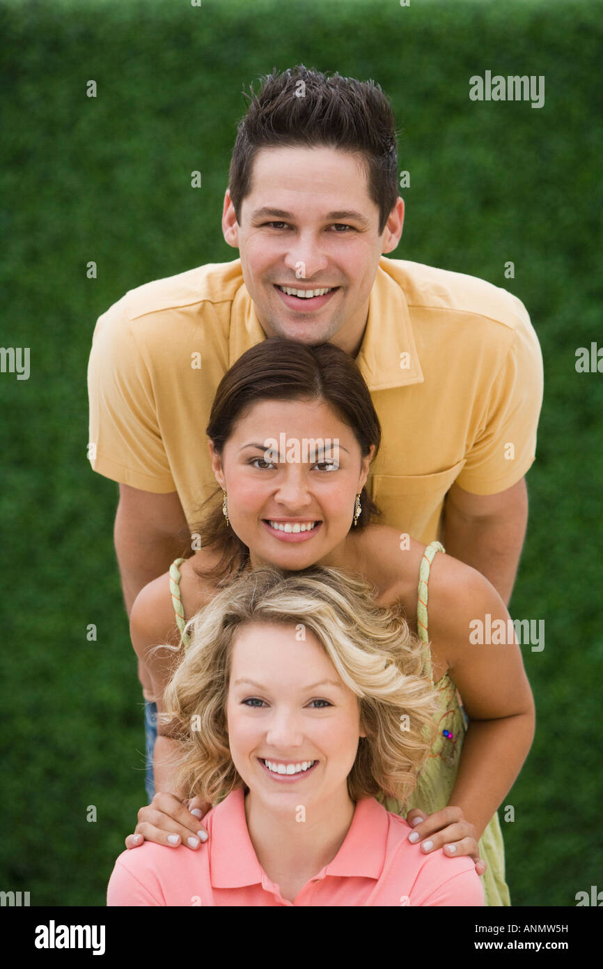 Happy three friends posing hi-res stock photography and images - Alamy