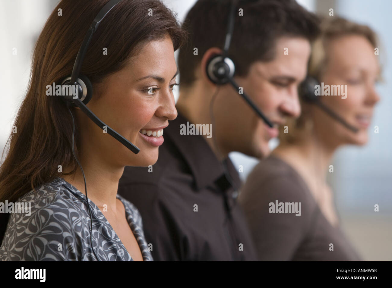 Three people headsets hi-res stock photography and images - Alamy