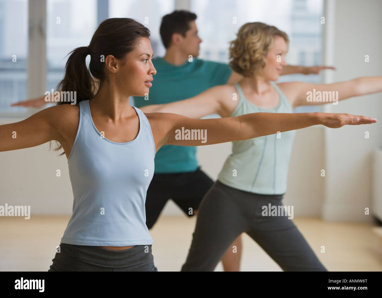 Multi-ethnic people in yoga class Stock Photo - Alamy