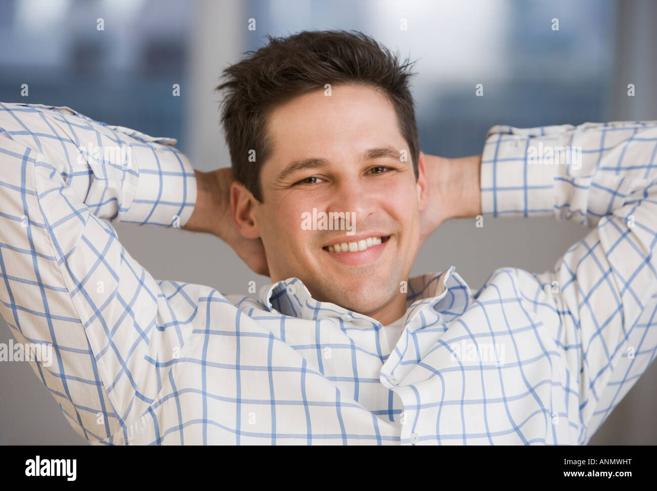 Man looking at camera, hands on head hi-res stock photography and ...