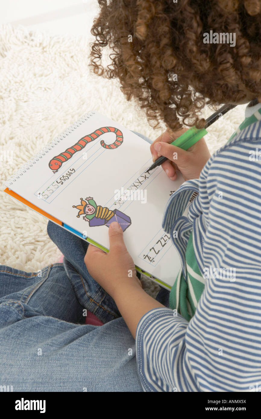 Child handwriting practice hi-res stock photography and images - Alamy