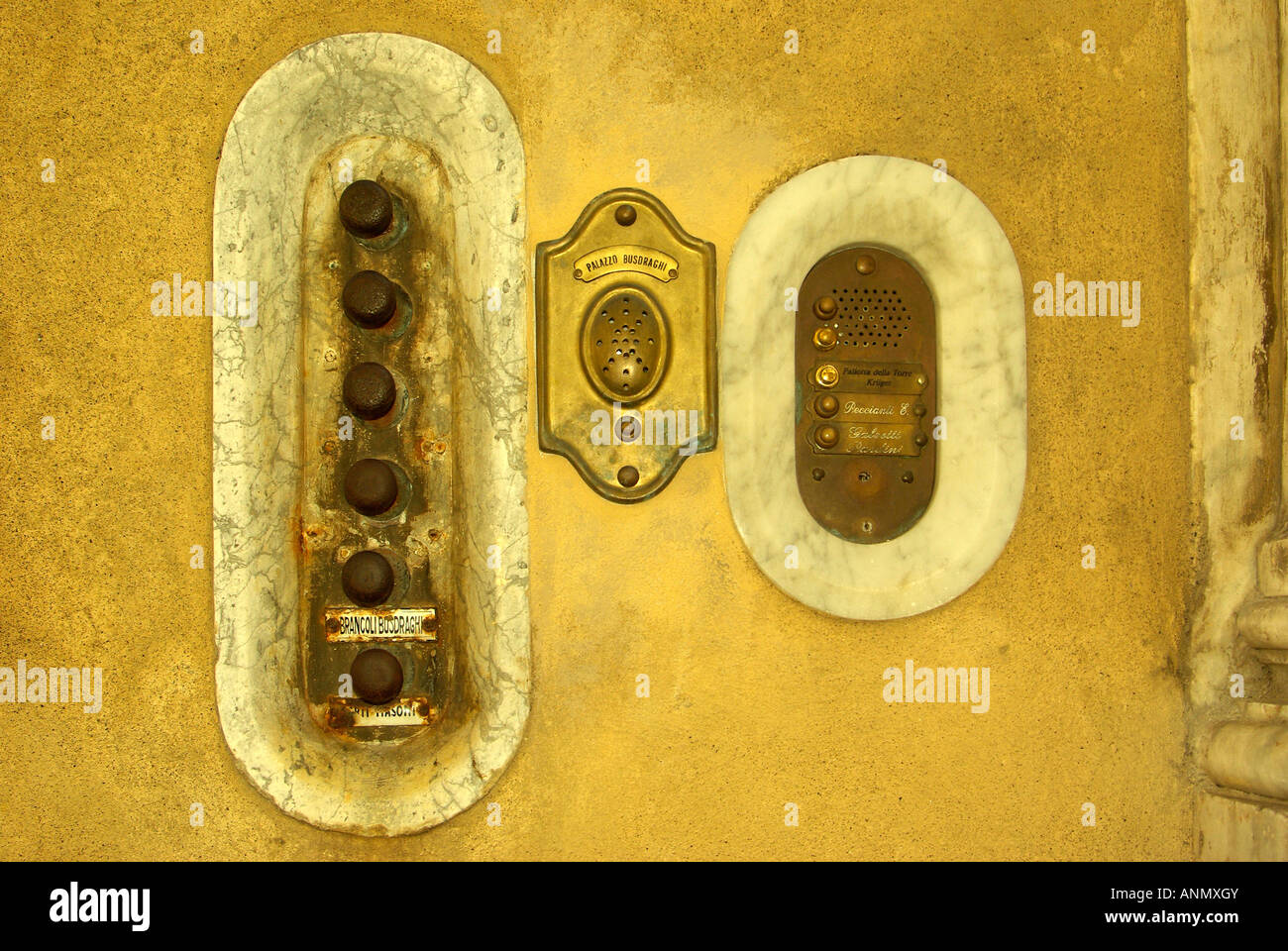 Old brass door buzzers and intercom in Lucca Tuscany Italy Stock Photo ...