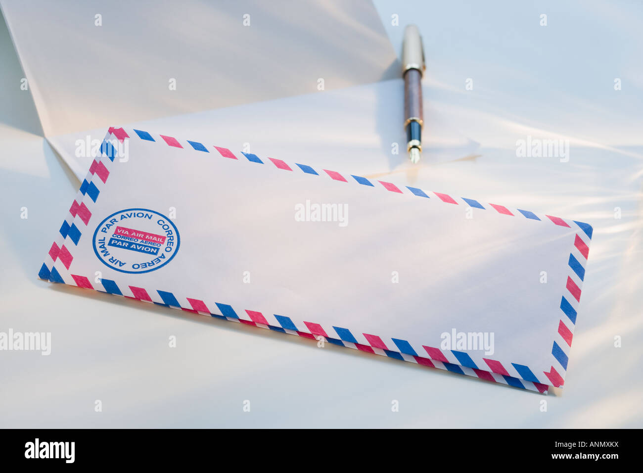 International envelope and pen Stock Photo - Alamy