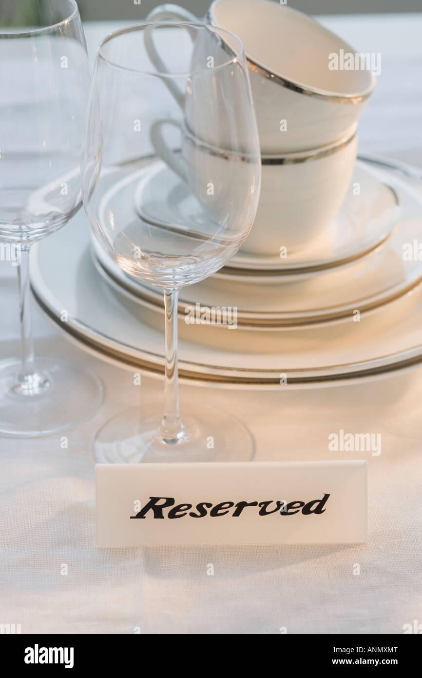 Reserved sign at place setting Stock Photo - Alamy
