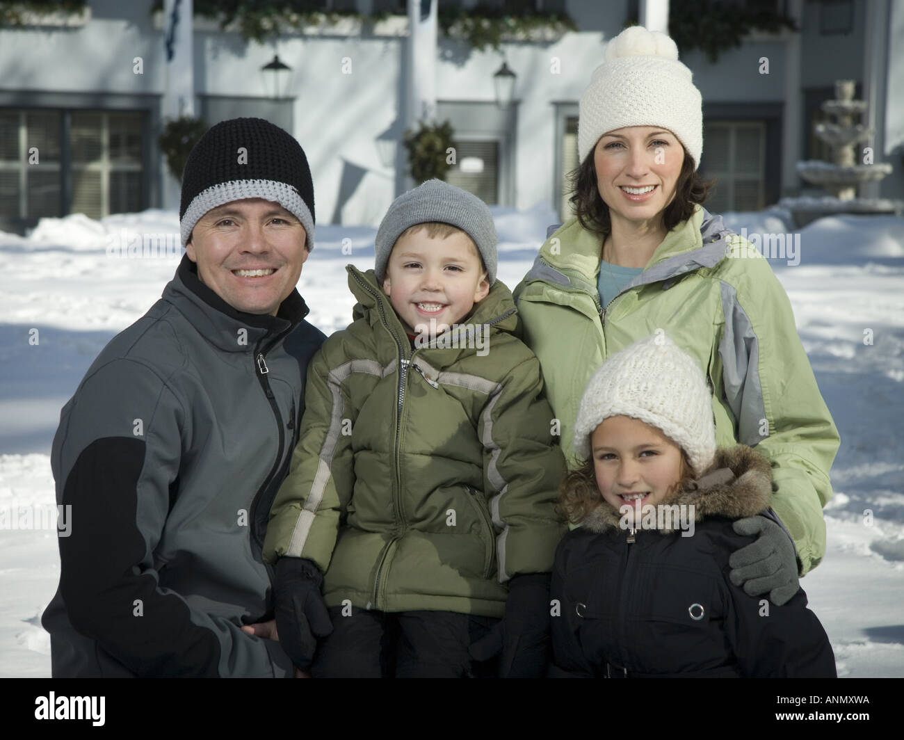 Portrait of parents with their two children Stock Photo - Alamy