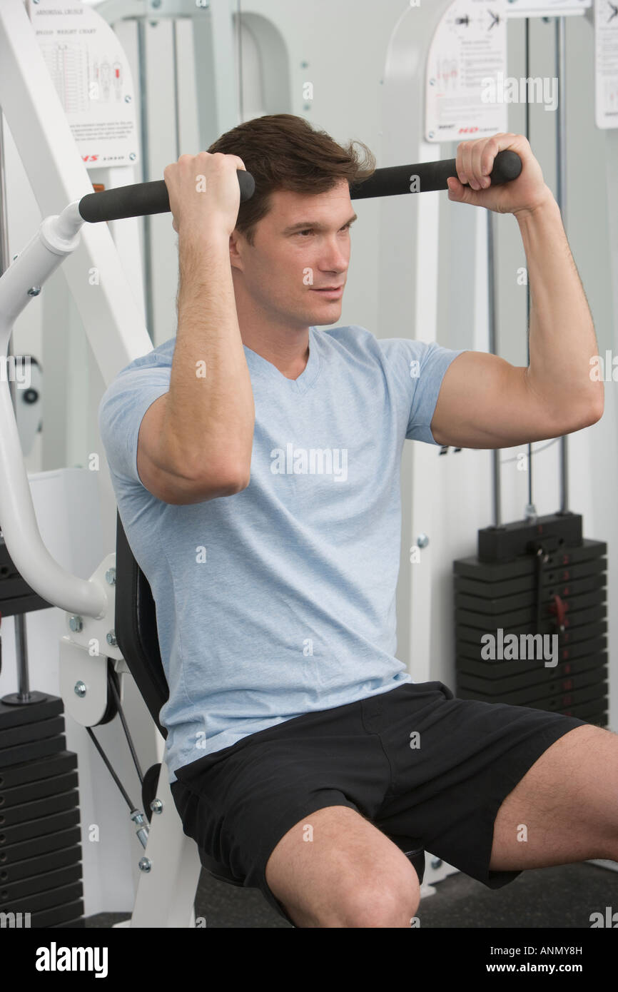 Man exercising at gym Stock Photo - Alamy