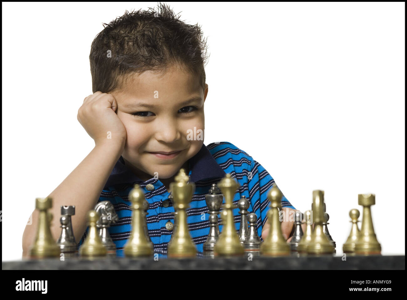 Portrait of a boy playing chess Stock Photo - Alamy