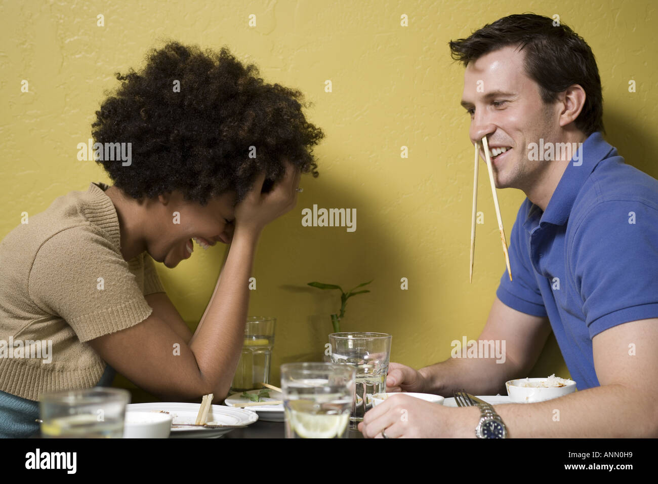 Man head in hands dining table hi-res stock photography and images - Alamy