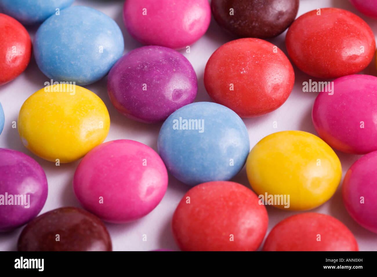 Chocolate confettis in different colours Stock Photo - Alamy