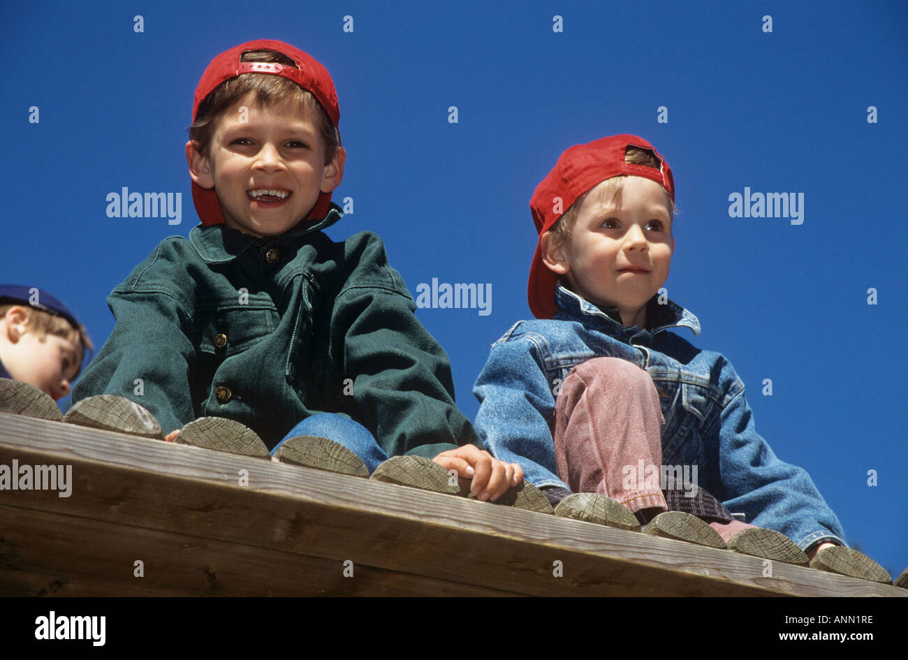 Children smiling two bonnet hi-res stock photography and images - Alamy