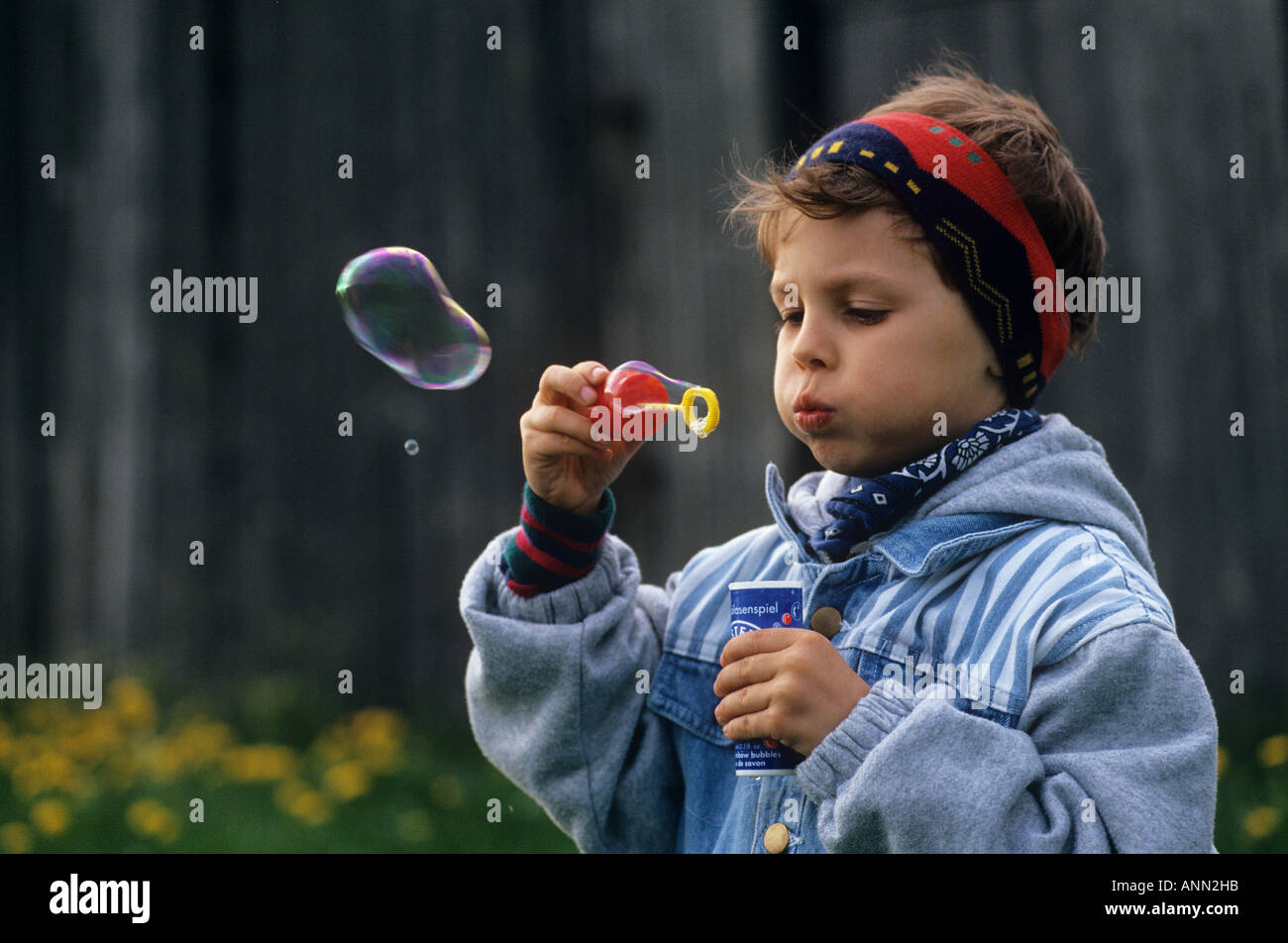 child - playing with soap bubble Stock Photo - Alamy
