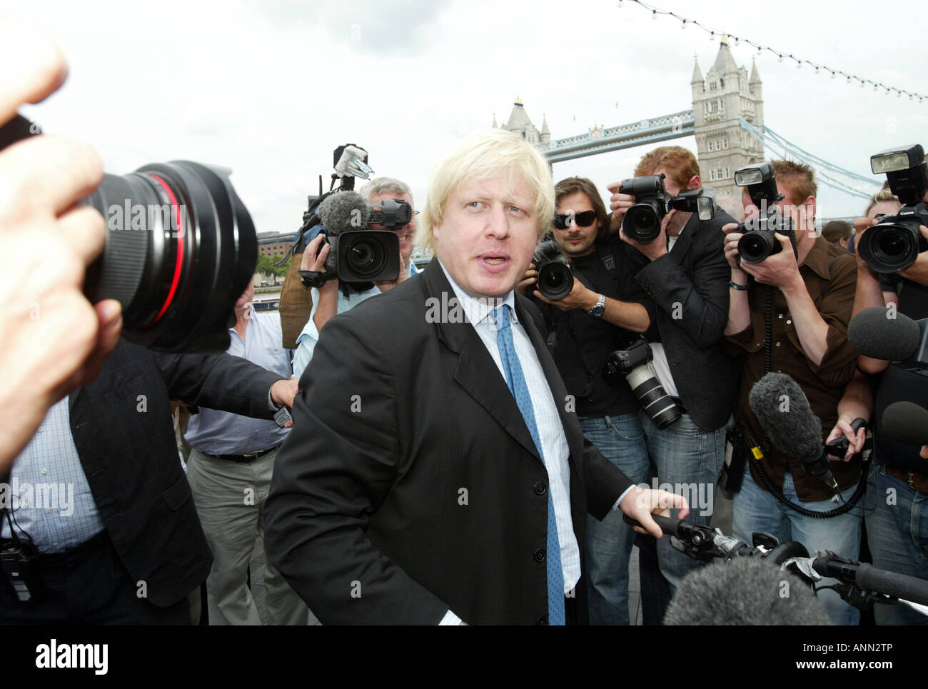 Conservative MP Boris Johnson is surrounded by members of the press as ...