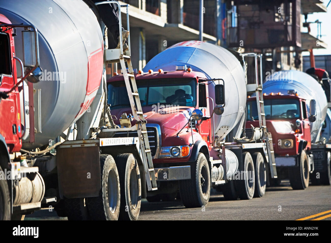 Cement construction trucks row hi-res stock photography and images - Alamy