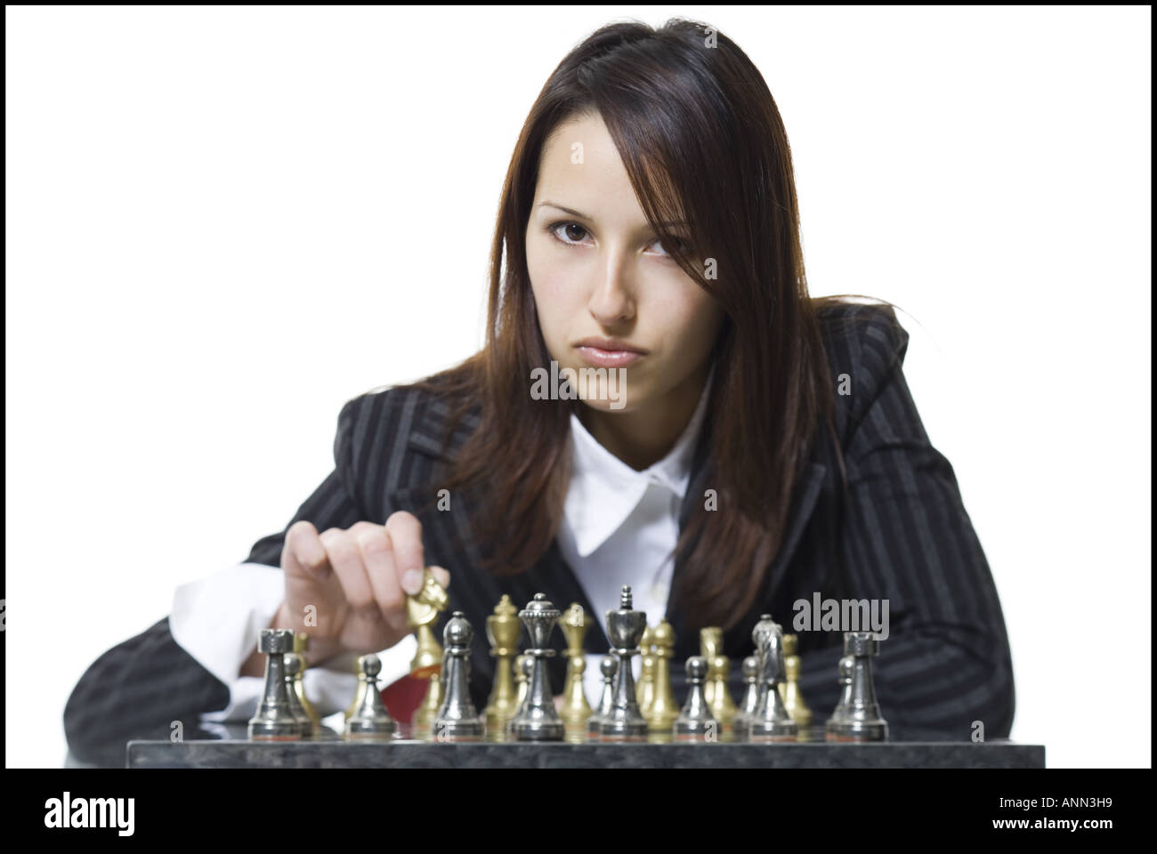 Portrait of a woman playing chess hi-res stock photography and images ...