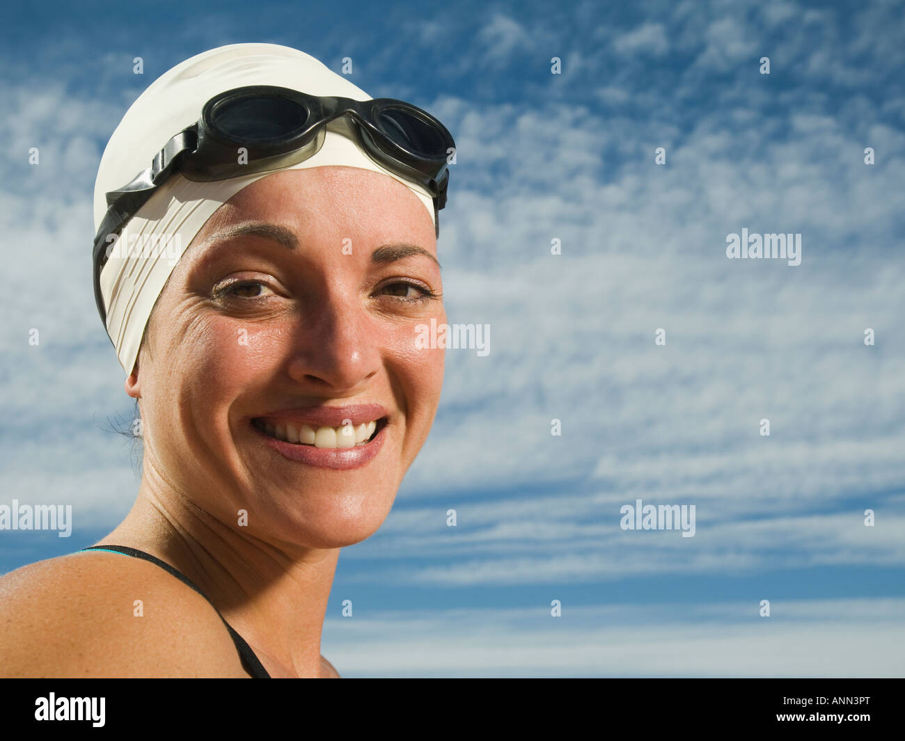 Woman wearing swimming cap and goggles, Utah, United States Stock Photo ...