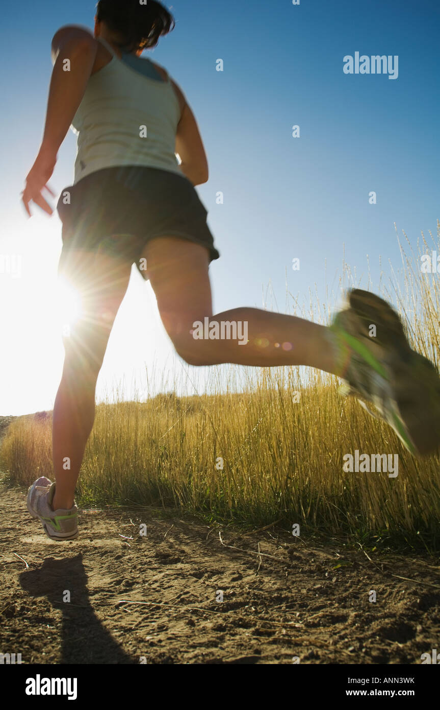 Woman running on trail, Salt Flats, Utah, United States Stock Photo - Alamy