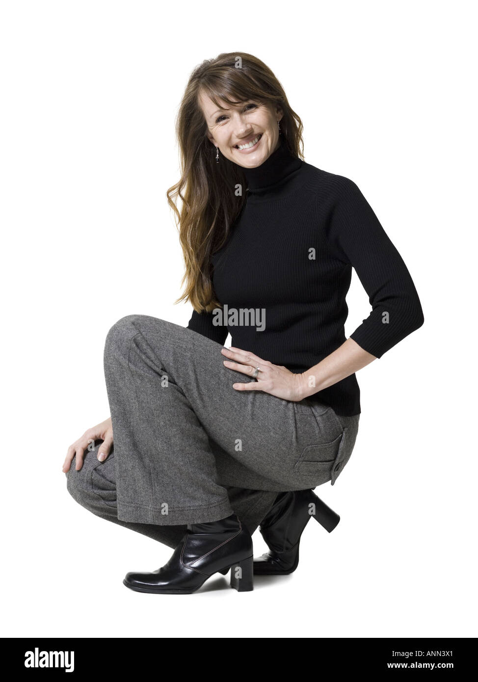 Side view woman crouching on Cut Out Stock Images & Pictures - Alamy