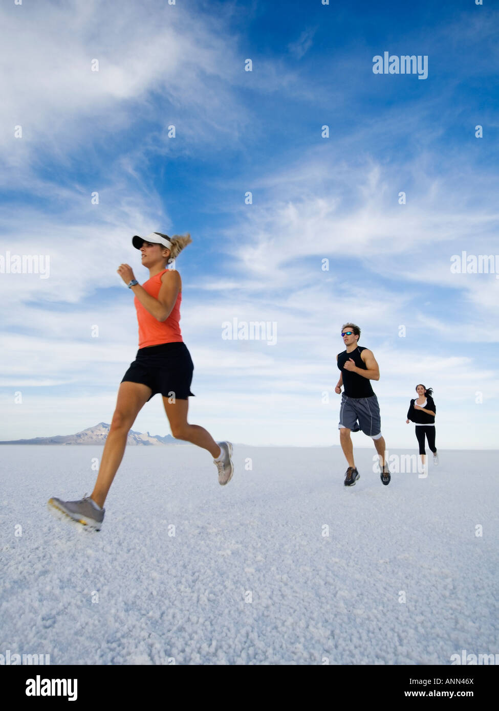 People running on salt flats, Utah, United States Stock Photo - Alamy