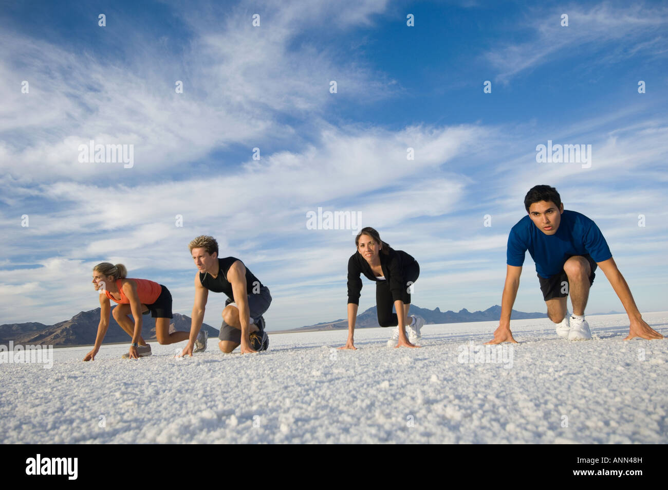 People at starting line on salt flats, Utah, United States Stock Photo ...