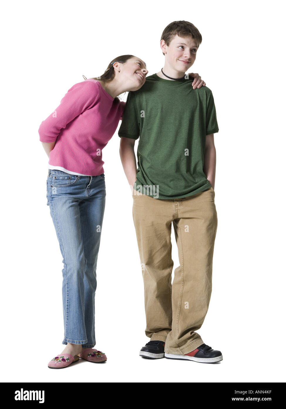 Brother standing with his sister and looking up Stock Photo - Alamy